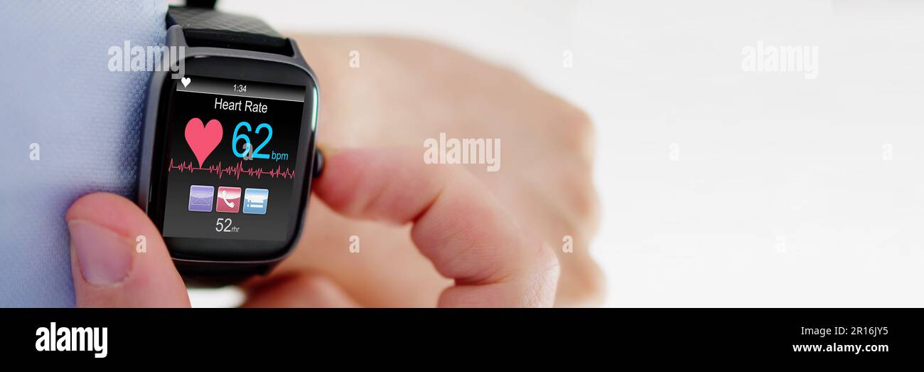 Smart Watch Showing Heartbeat Monitor On Man's Hand Stock Photo - Alamy