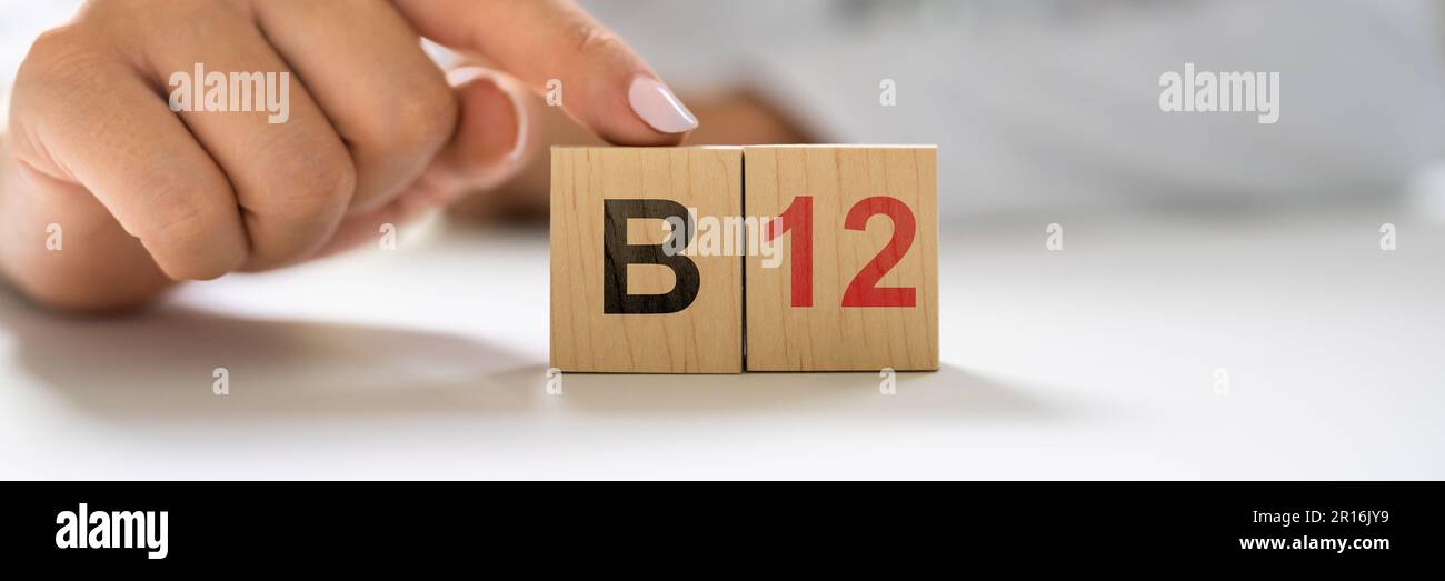 Vitamin B12. Medical Doctor Hand In Hospital Stock Photo - Alamy