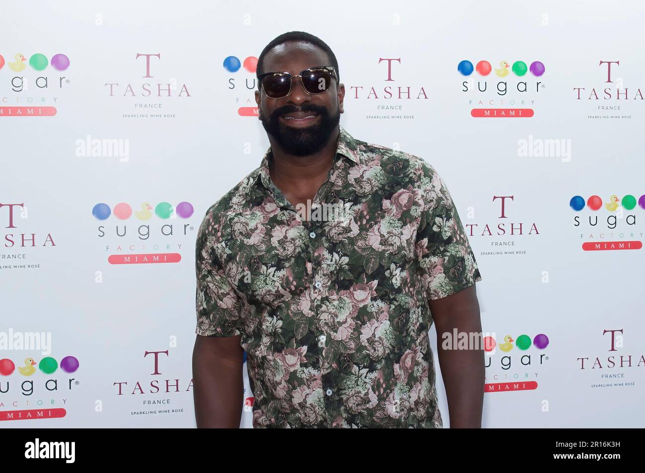 DJ Irie attends the VIP Grand Opening of Sugar Factory Miami on ...