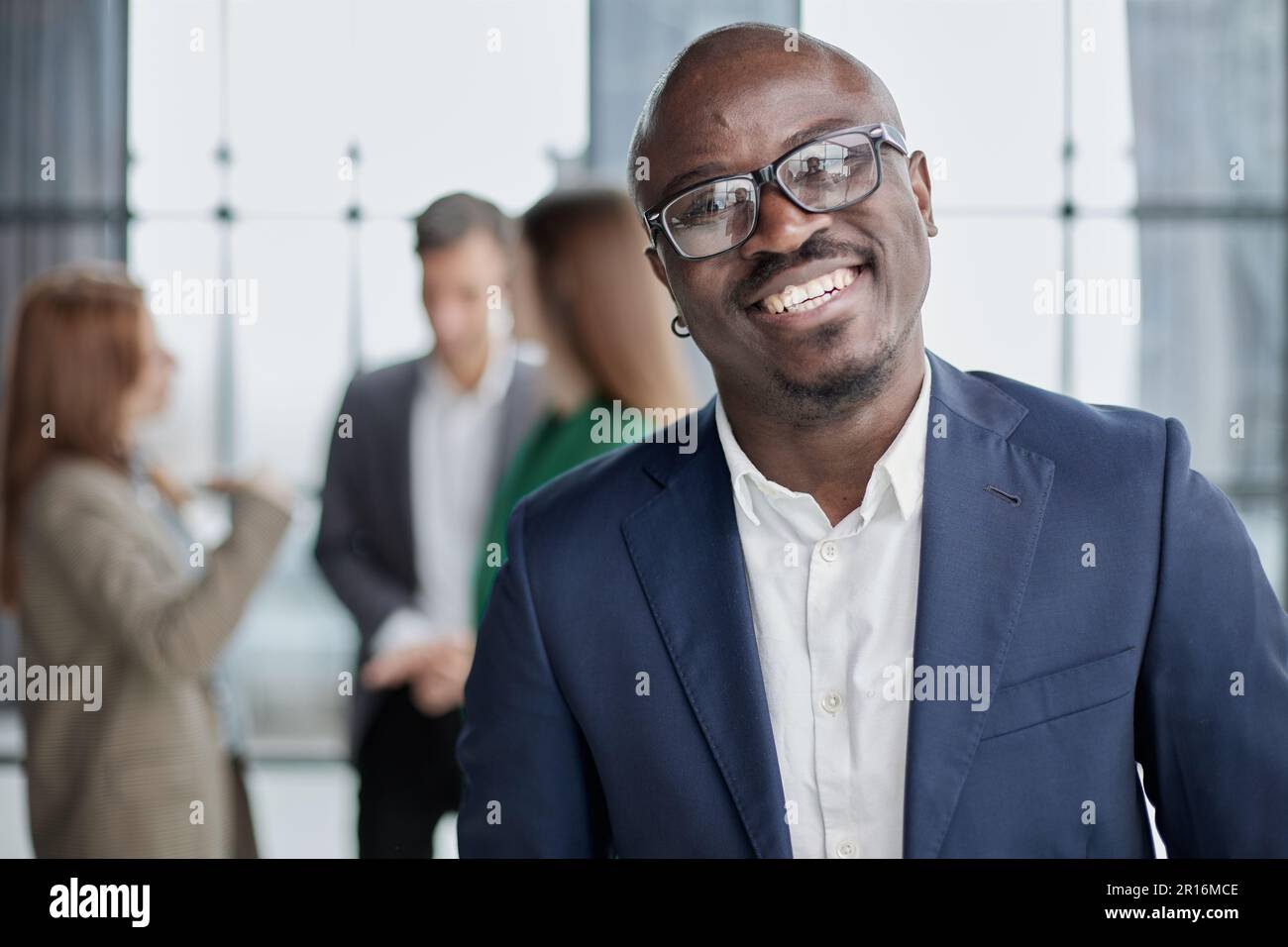 Handsome african american executive businessman in modern office Stock ...
