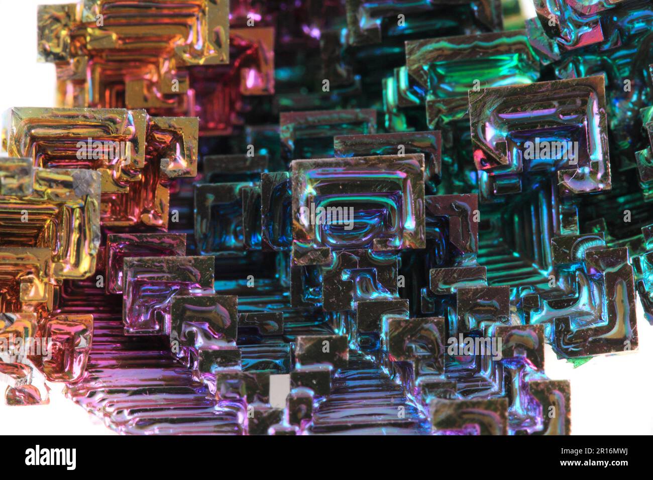 Bismuth - rainbow metal texture as color background Stock Photo - Alamy