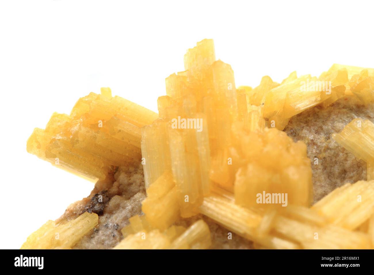 yellow alunite crystals isolated on the white background Stock Photo ...