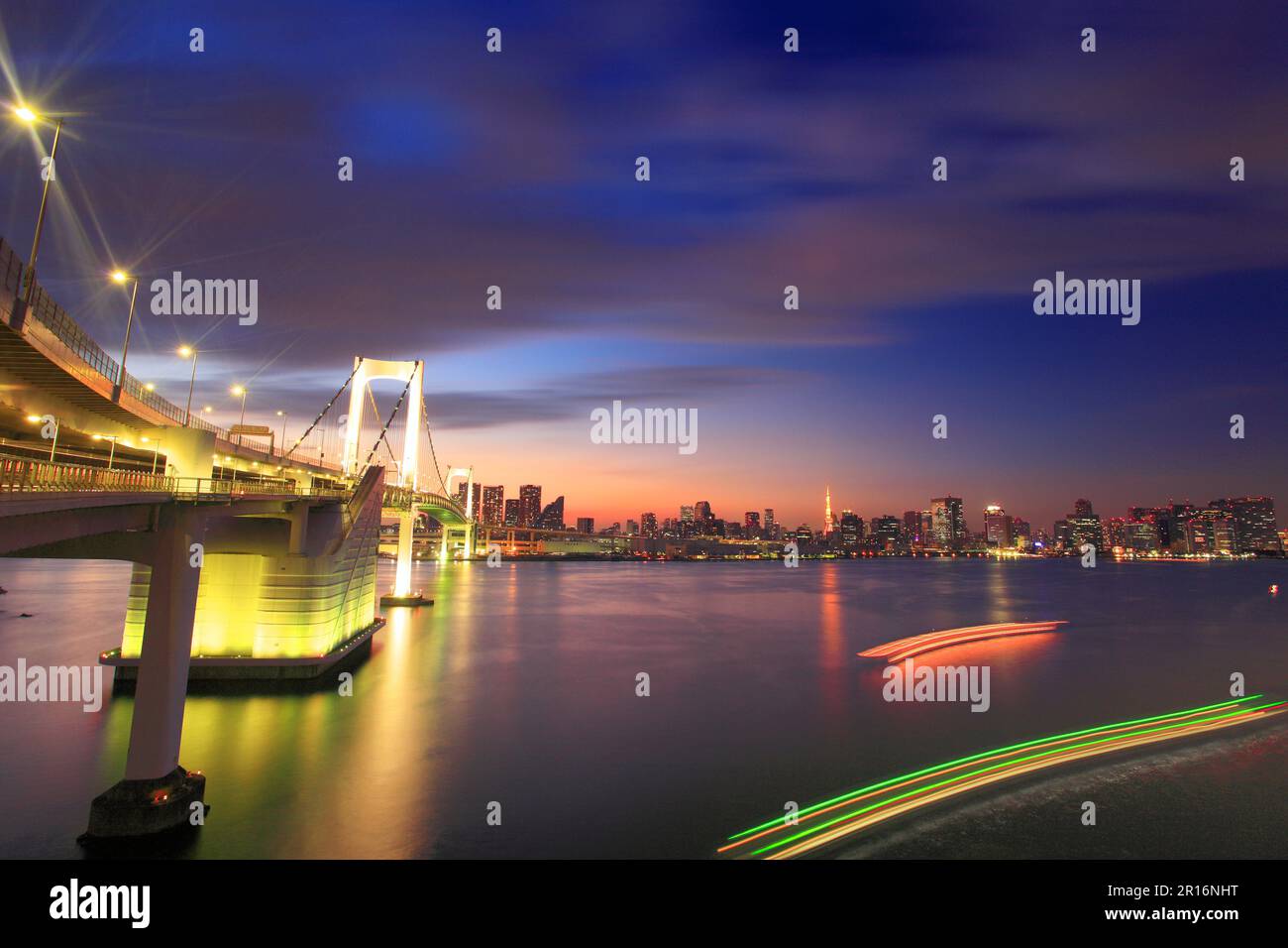 Ship and Tokyo Tower and building group and the Rainbow Bridge at night ...