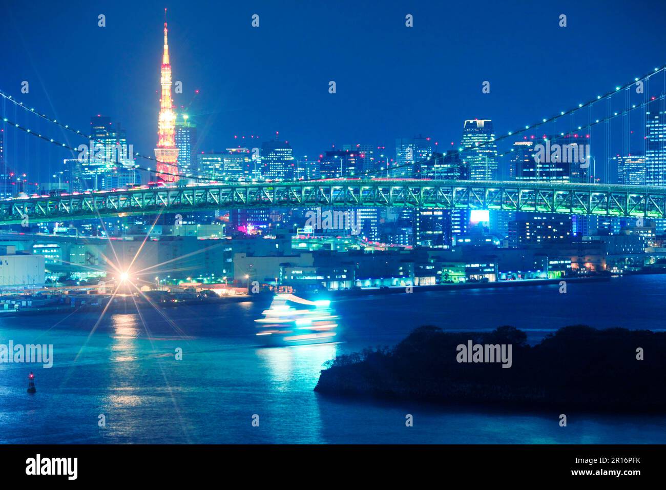 Ferry and Tokyo Tower and Rainbow Bridge at night Stock Photo - Alamy
