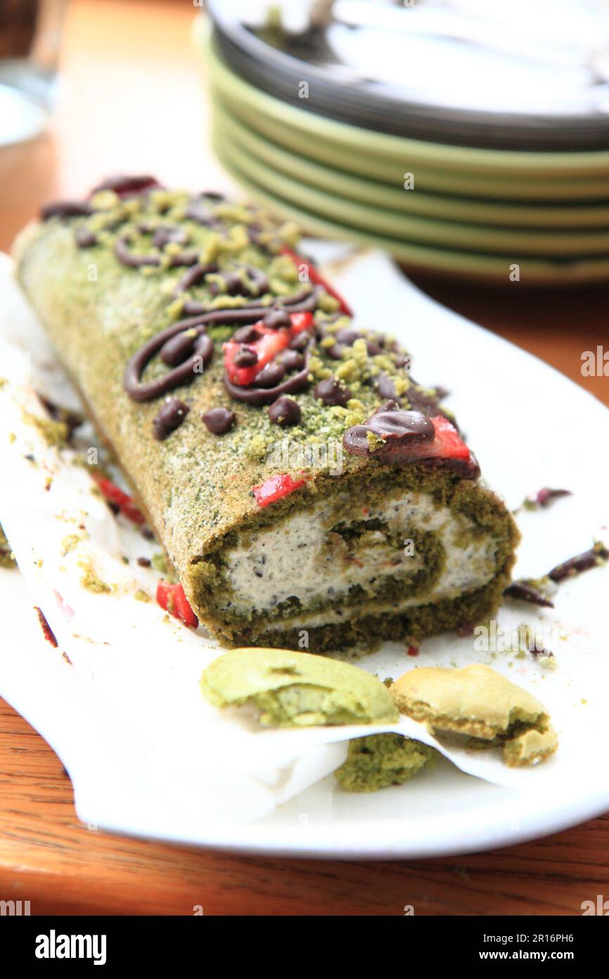 pistachio roulade dessert as very nice food background Stock Photo - Alamy