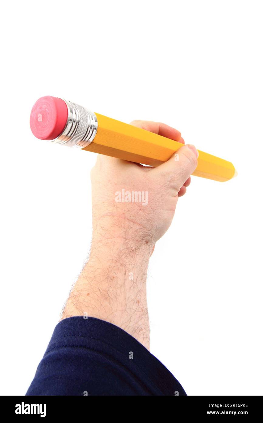 big pencil in human hand isolated on the white background Stock Photo ...