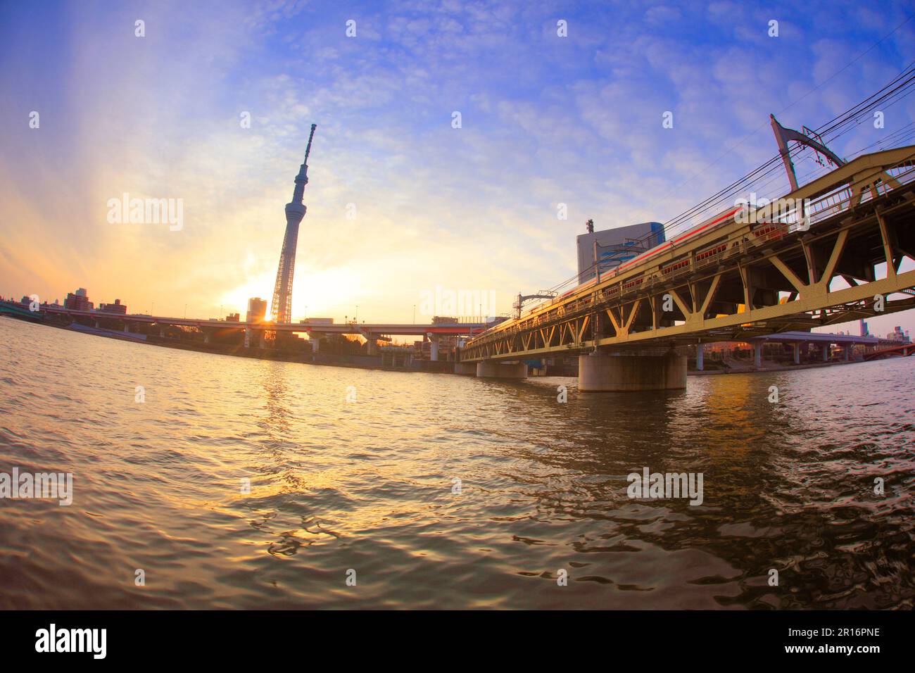 Tokyo Skytree, Morning Sunlight and Tobu Railway Train Stock Photo - Alamy