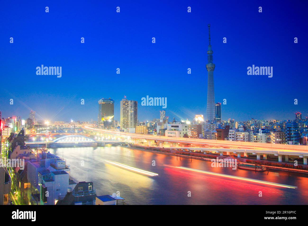 Tokyo Skytree, Sumida River, Komagata Bridge and moving ships, night ...