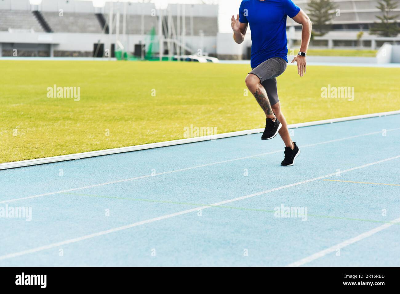 Hes out on his own in front. an unrecognizable young male athlete ...