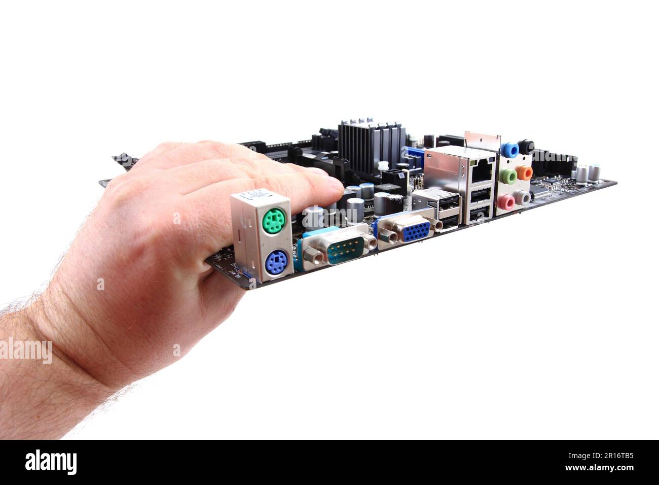 motherboard in human hand isolated on the white background Stock Photo ...
