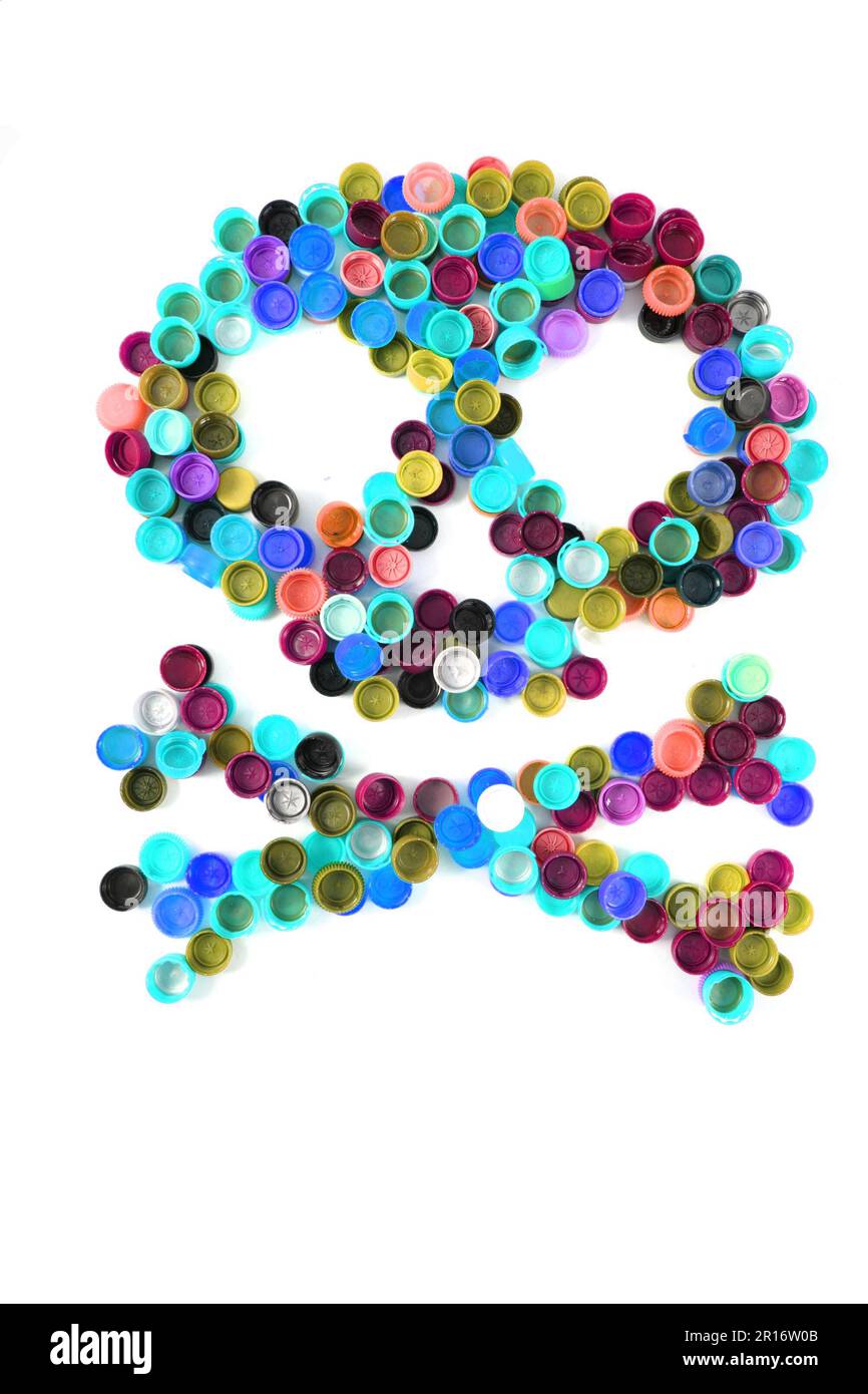 human skull from the plastic caps isolated on the white background ...