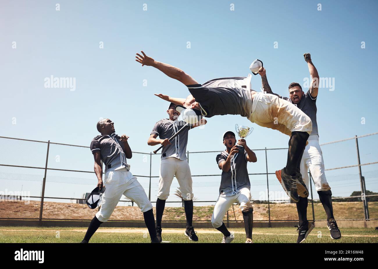 Teamwork is worth the win. a group of young baseball players ...