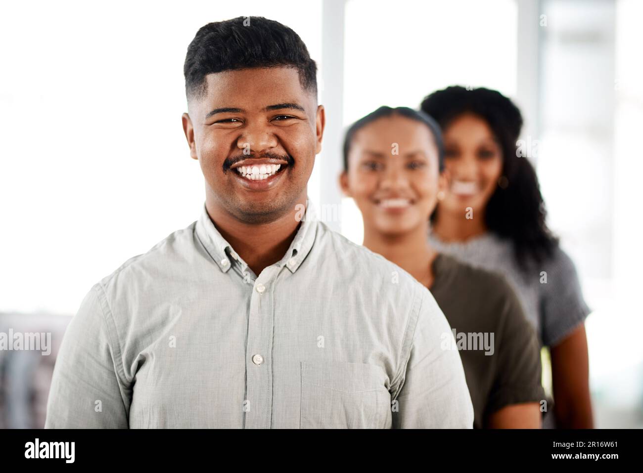 If one wins, we all win. Portrait of a team of young businesspeople ...