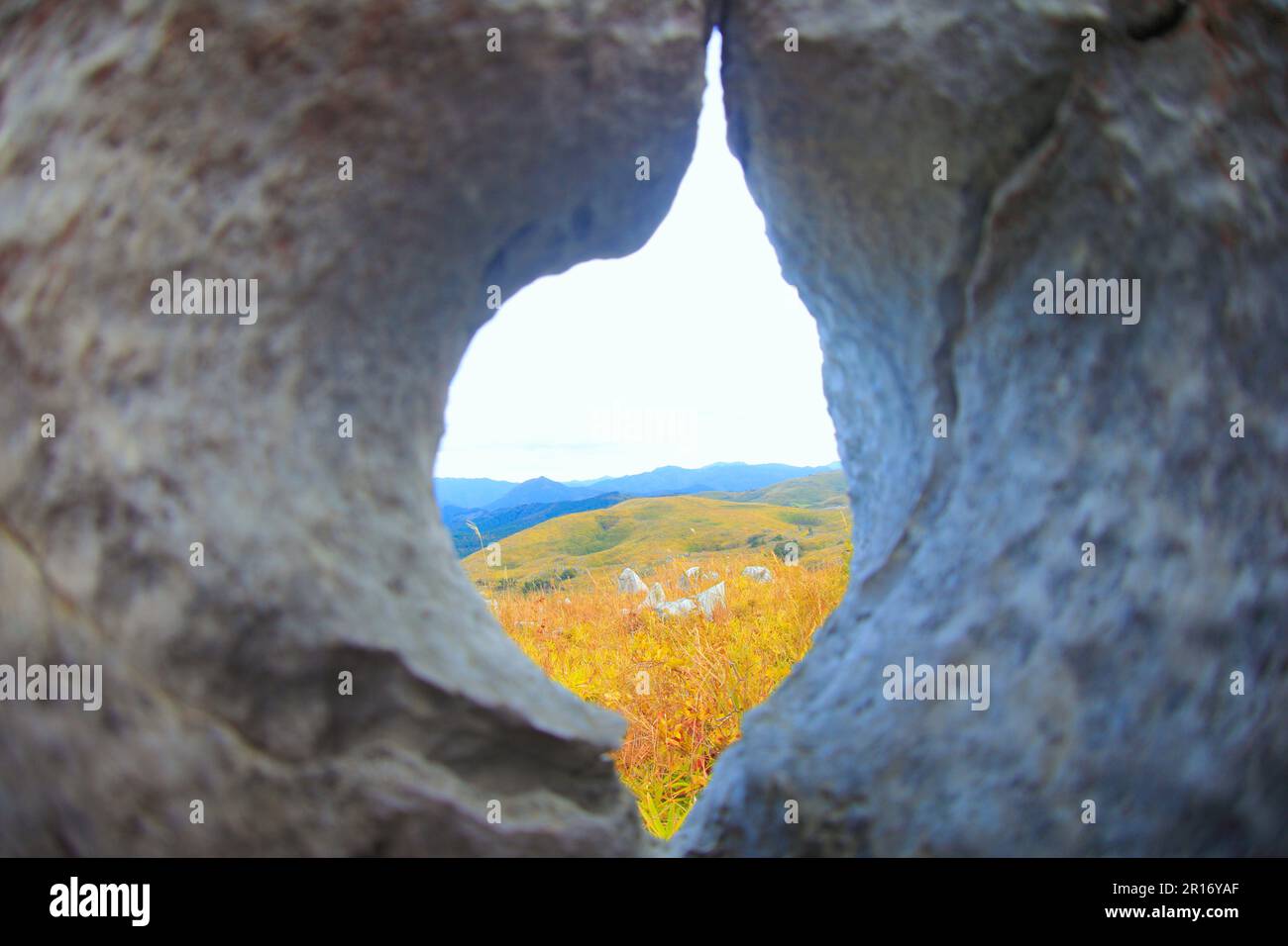 View of mount Gongenyama and Karst plateau seen through the hole of ...