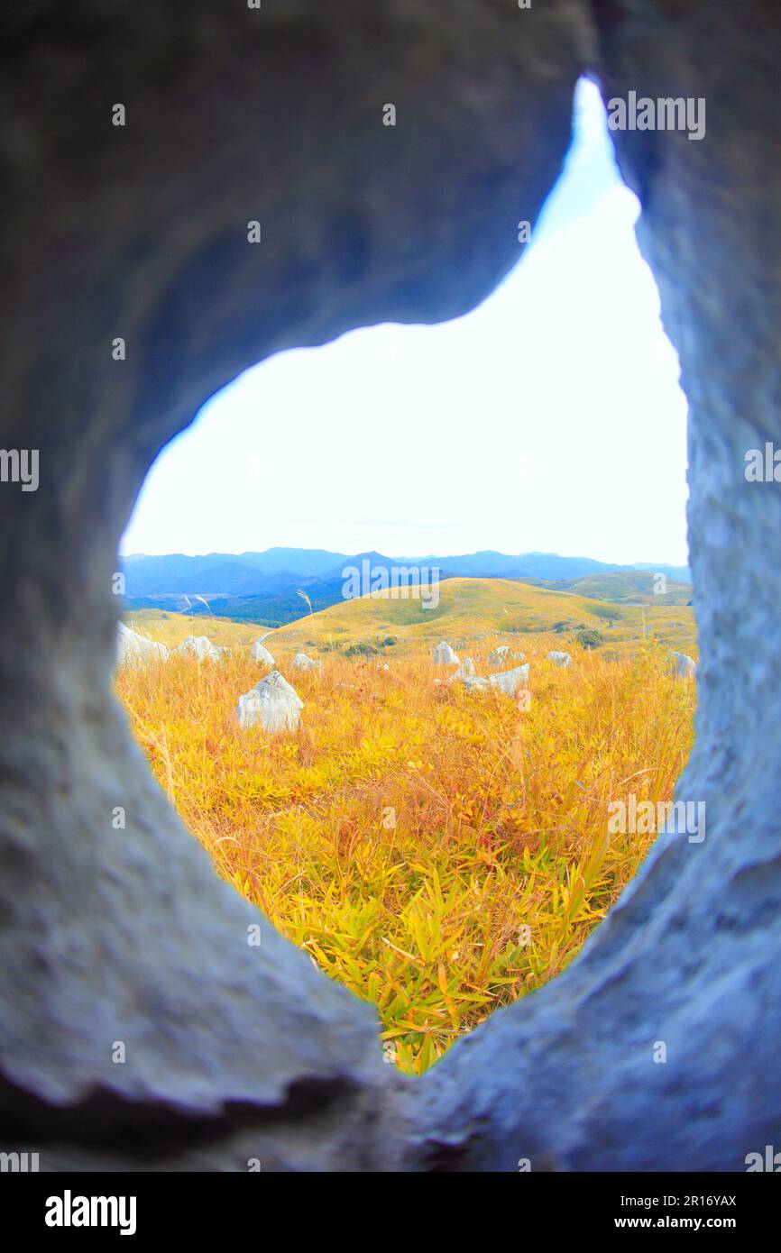 View of mount Gongenyama and Karst plateau seen through the hole of ...