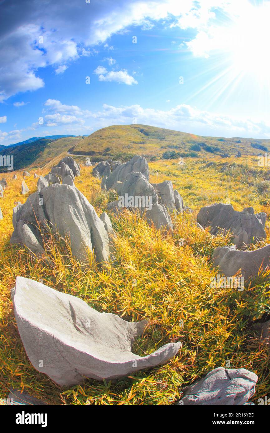 Glow of the sun on mount Kitayama and limestone of karst plateau Stock ...
