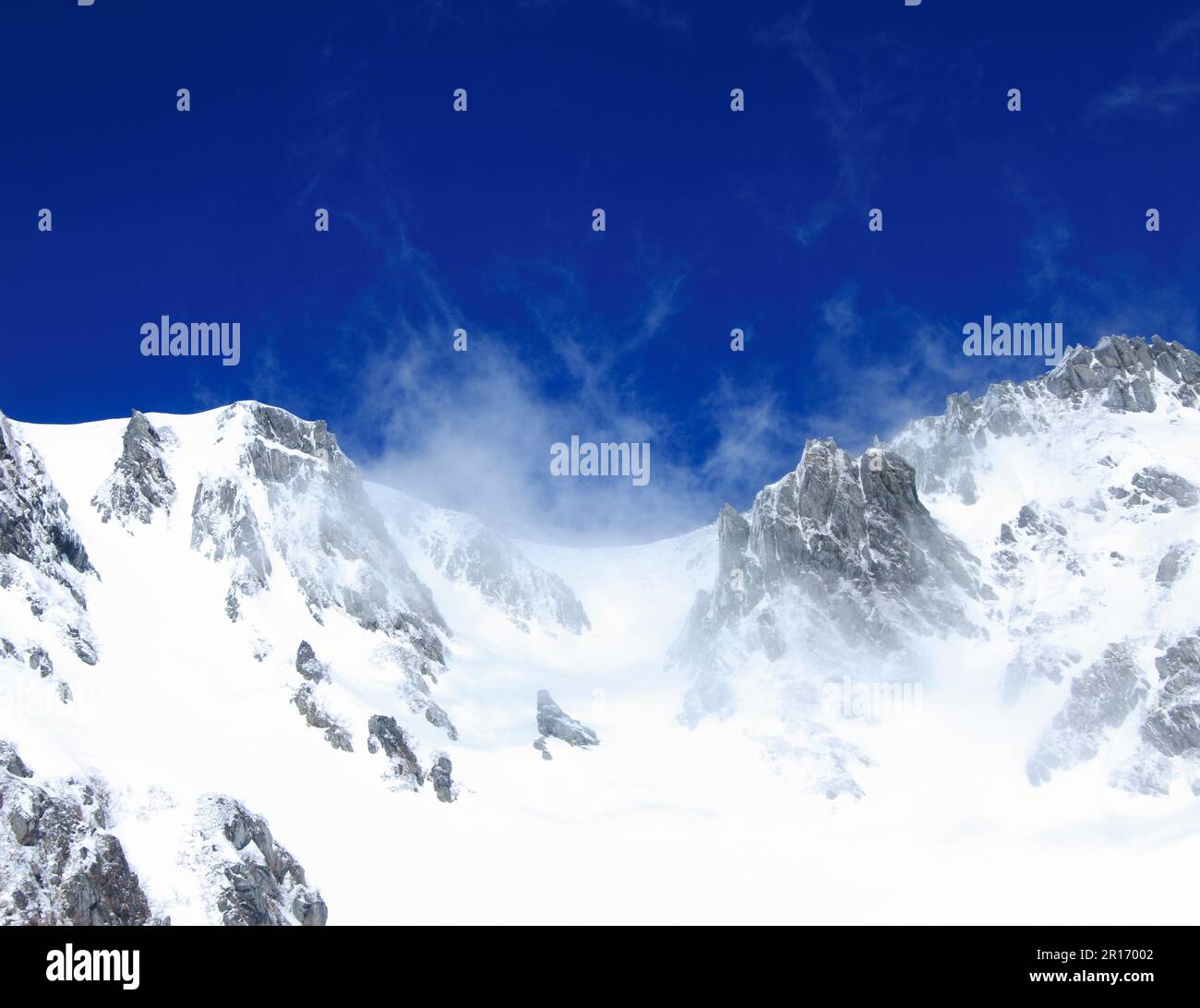 A cloud welling up against the angle of a rock at the head of Senjojiki ...
