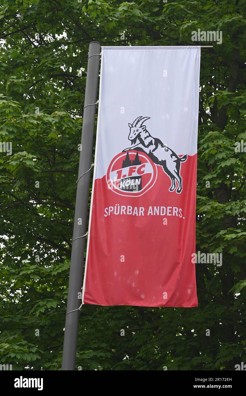 Cologne, Germany. 11th May, 2023. A flag in red and white with the logo ...
