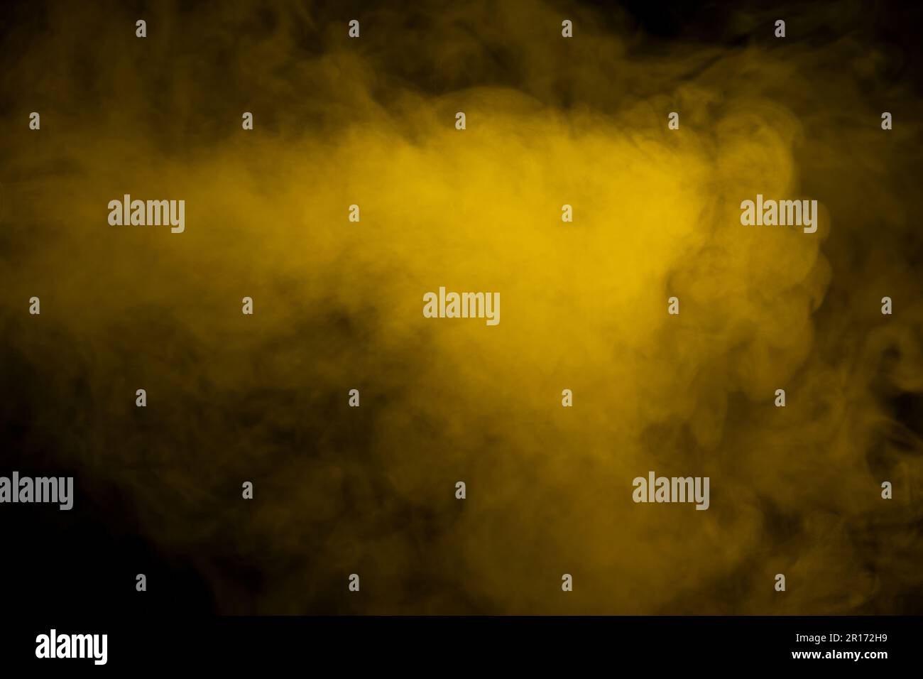Yellow steam on a black background. Copy space Stock Photo - Alamy