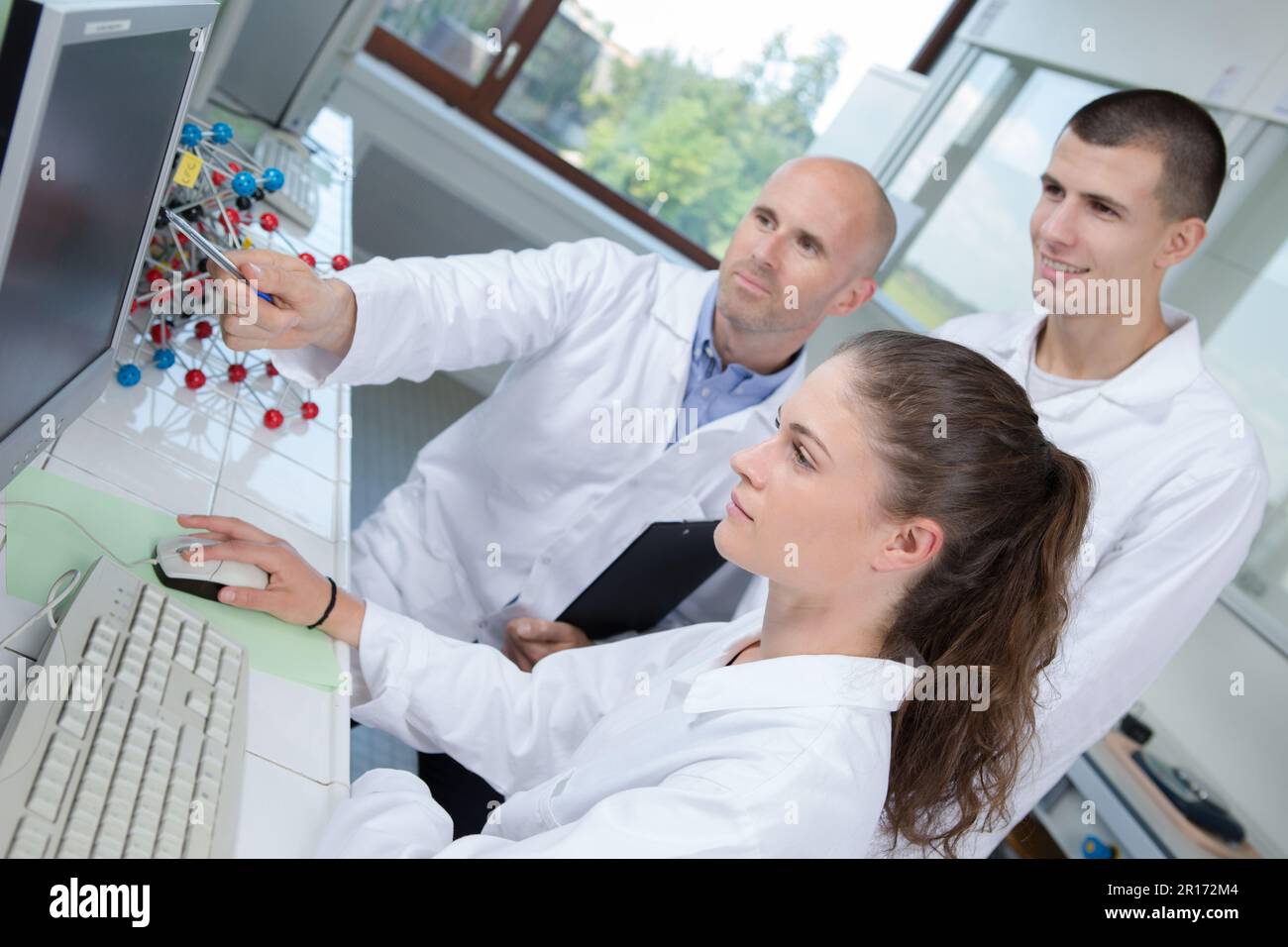technology students group in computer lab school classroom working on Stock Photo - Alamy