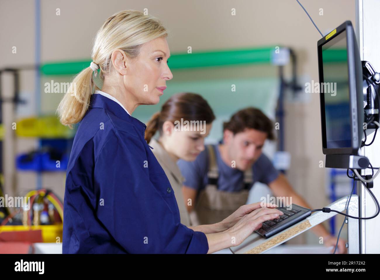 beautiful female engineer with computer Stock Photo - Alamy