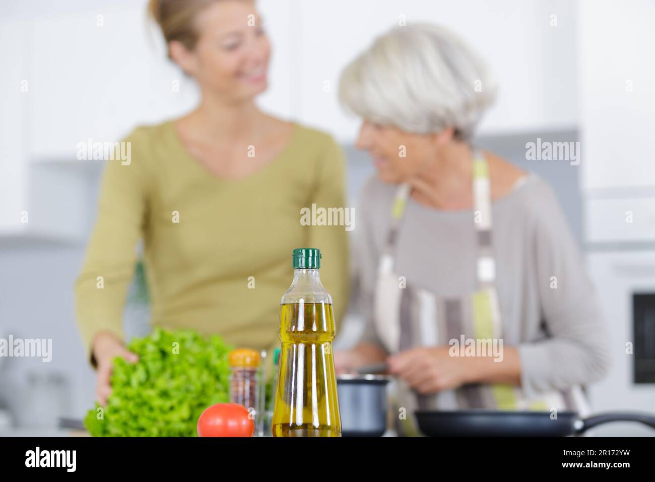 picture of two women cooking Stock Photo - Alamy