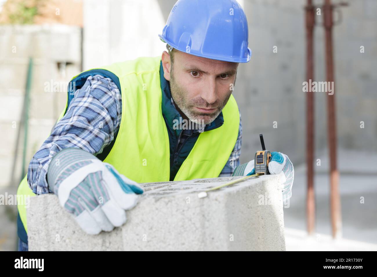 Worker Using Cement Bag