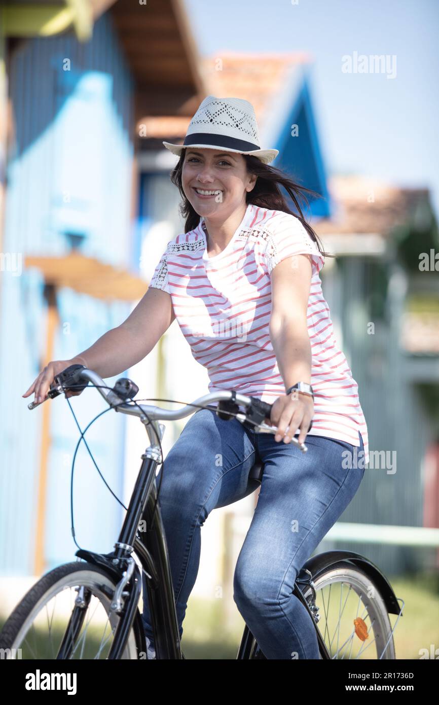 beautiful woman riding on bike Stock Photo - Alamy
