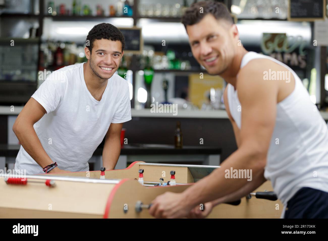a man playing table football Stock Photo - Alamy