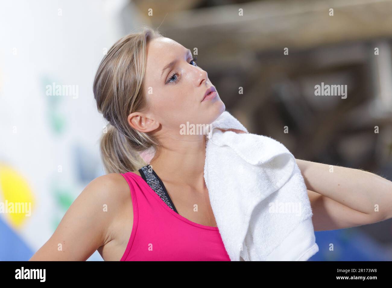 a woman wiping her sweat Stock Photo - Alamy