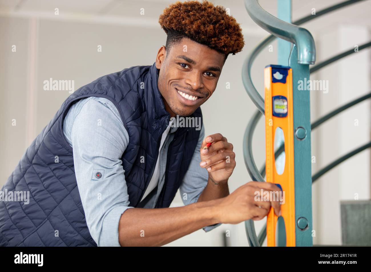 craftsman with tools with stairs Stock Photo - Alamy