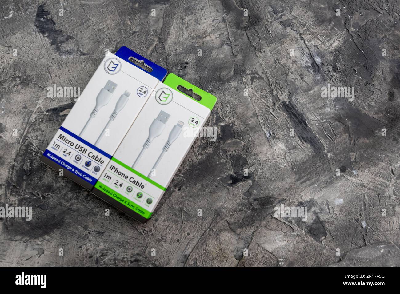 Useful USB cables micro and iPhone in matching retail boxes Stock Photo ...