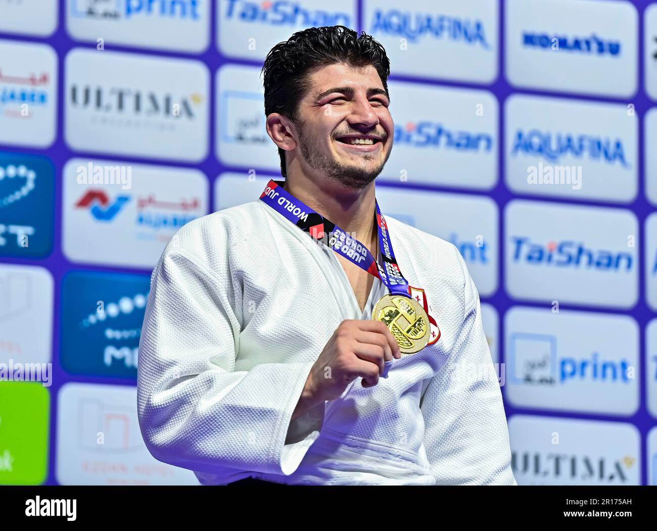 Doha. 11th May, 2023. Gold medalist Luka Maisuradze of Georgia poses on the podium during the ...