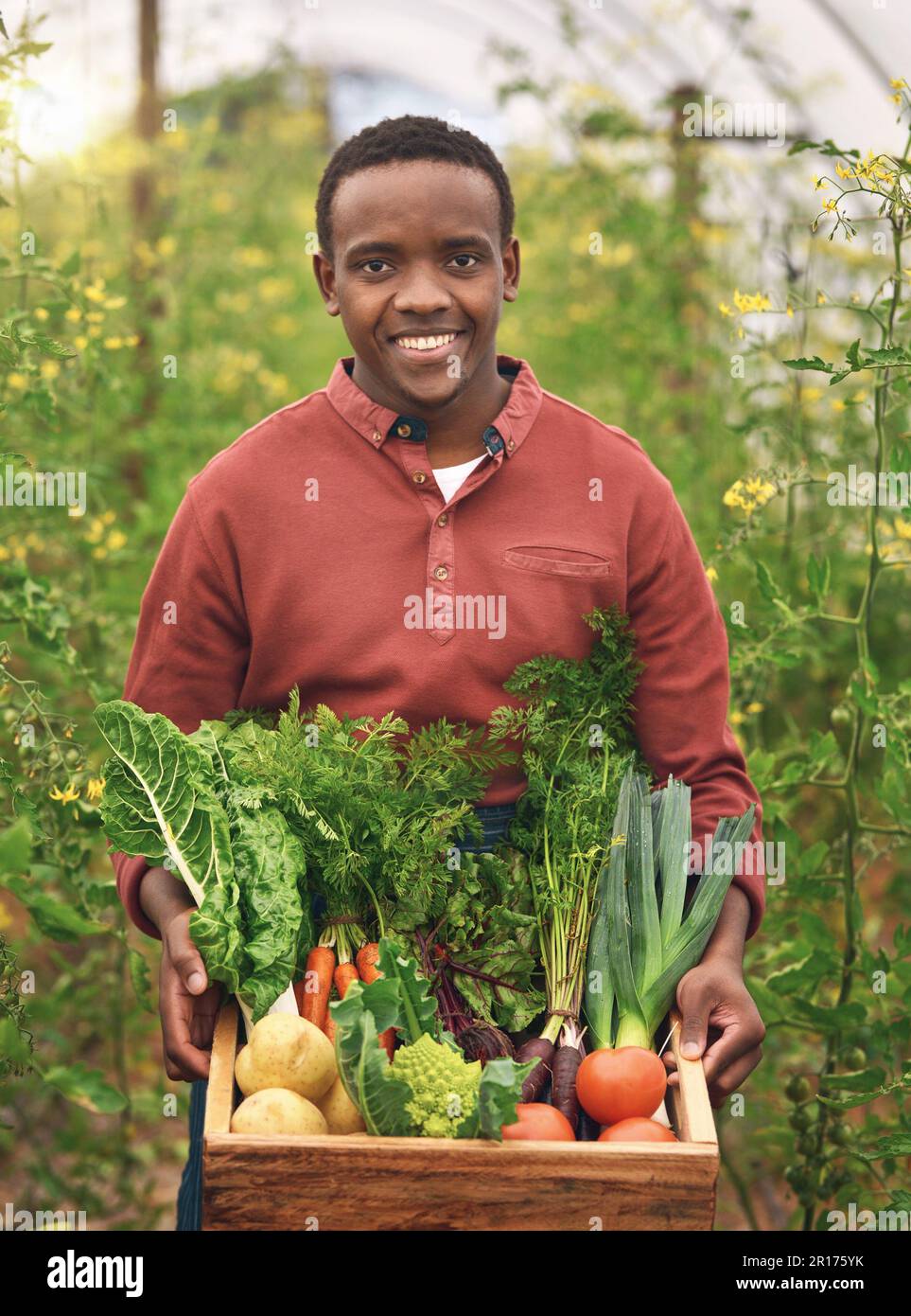 Proud of my produce. Cropped portrait of a handsome young male farmer ...