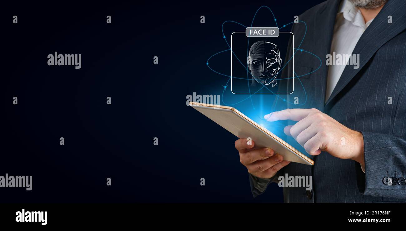 Man using tablet with face id scan and modern technology. Login using ...