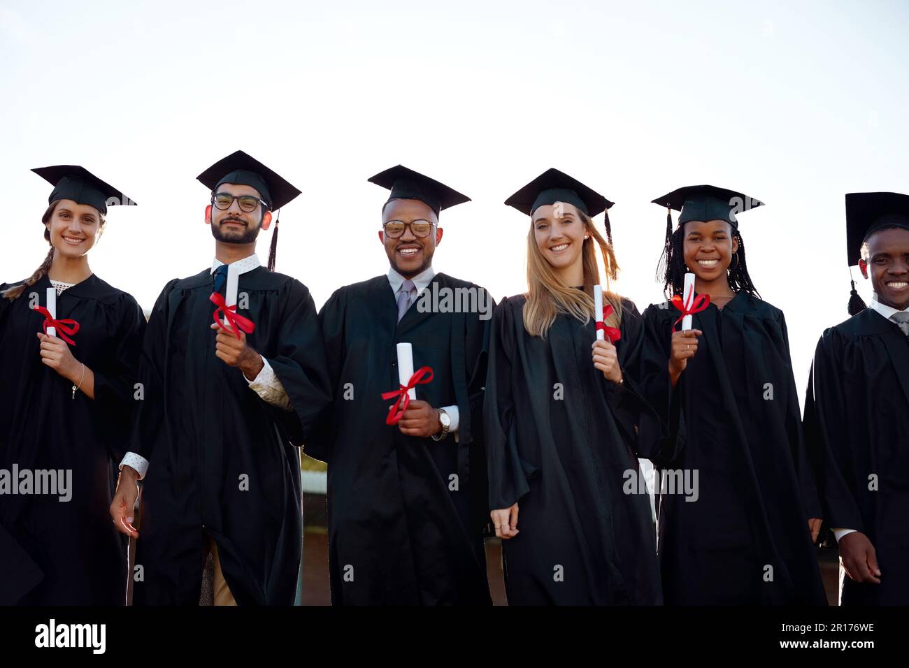 Ready to face the real world now. Portrait of a group of university ...