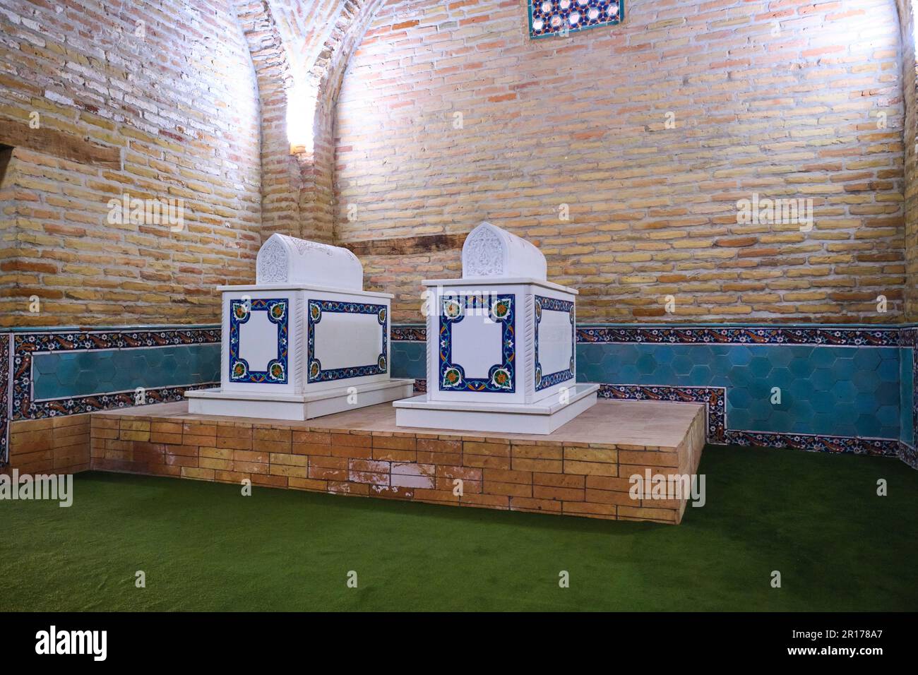 In a small room, two white marble graves, tombs. At the Sheikh Hovendi ...
