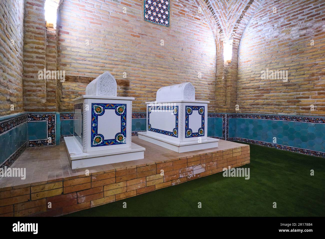 In a small room, two white marble graves, tombs. At the Sheikh Hovendi ...