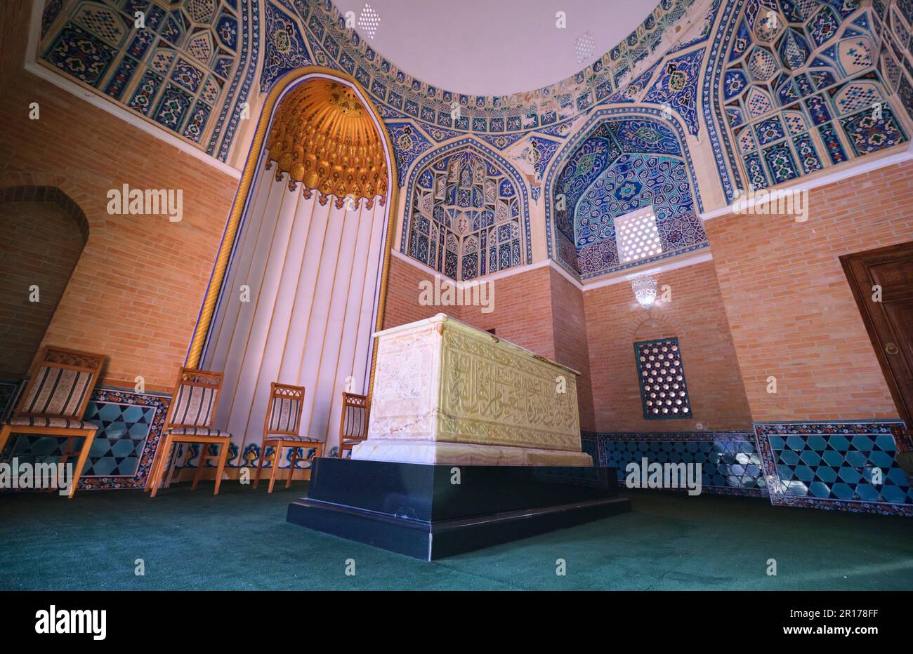Interior view of white marble tomb, grave with elaborate tile work on ...