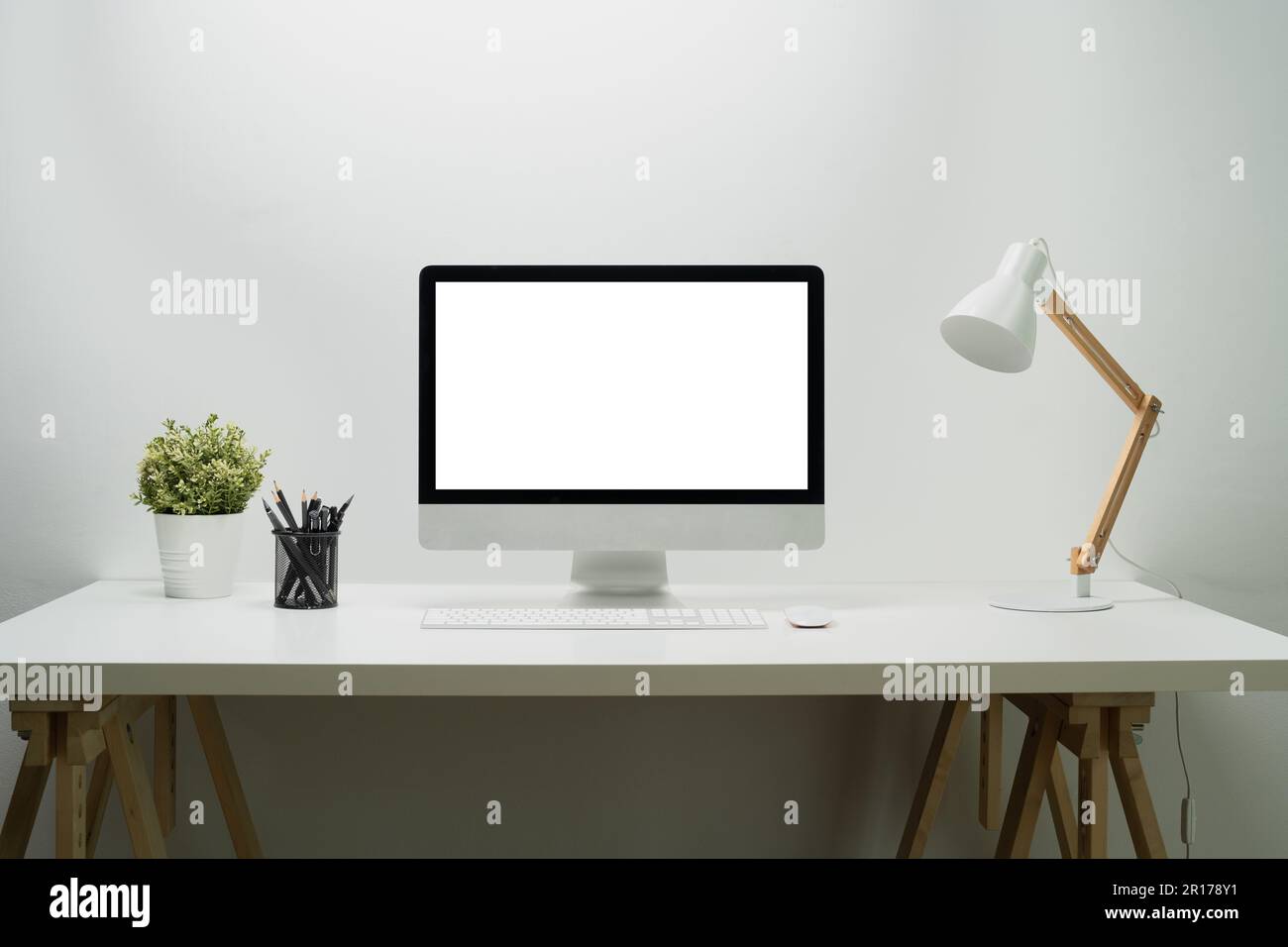 Modern workplace with bank screen of desktop computer on desk. White ...