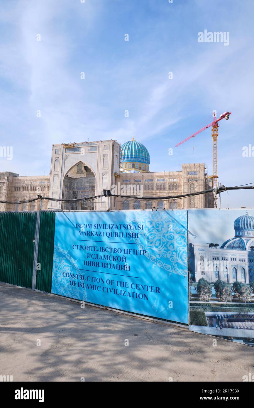 View of the large site with contruction fence and sign. At the huge ...