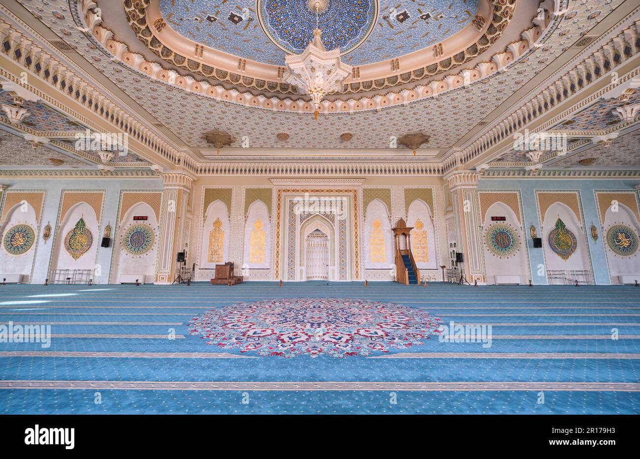 View of the center interior of the mosque, with small minbar. At the ...