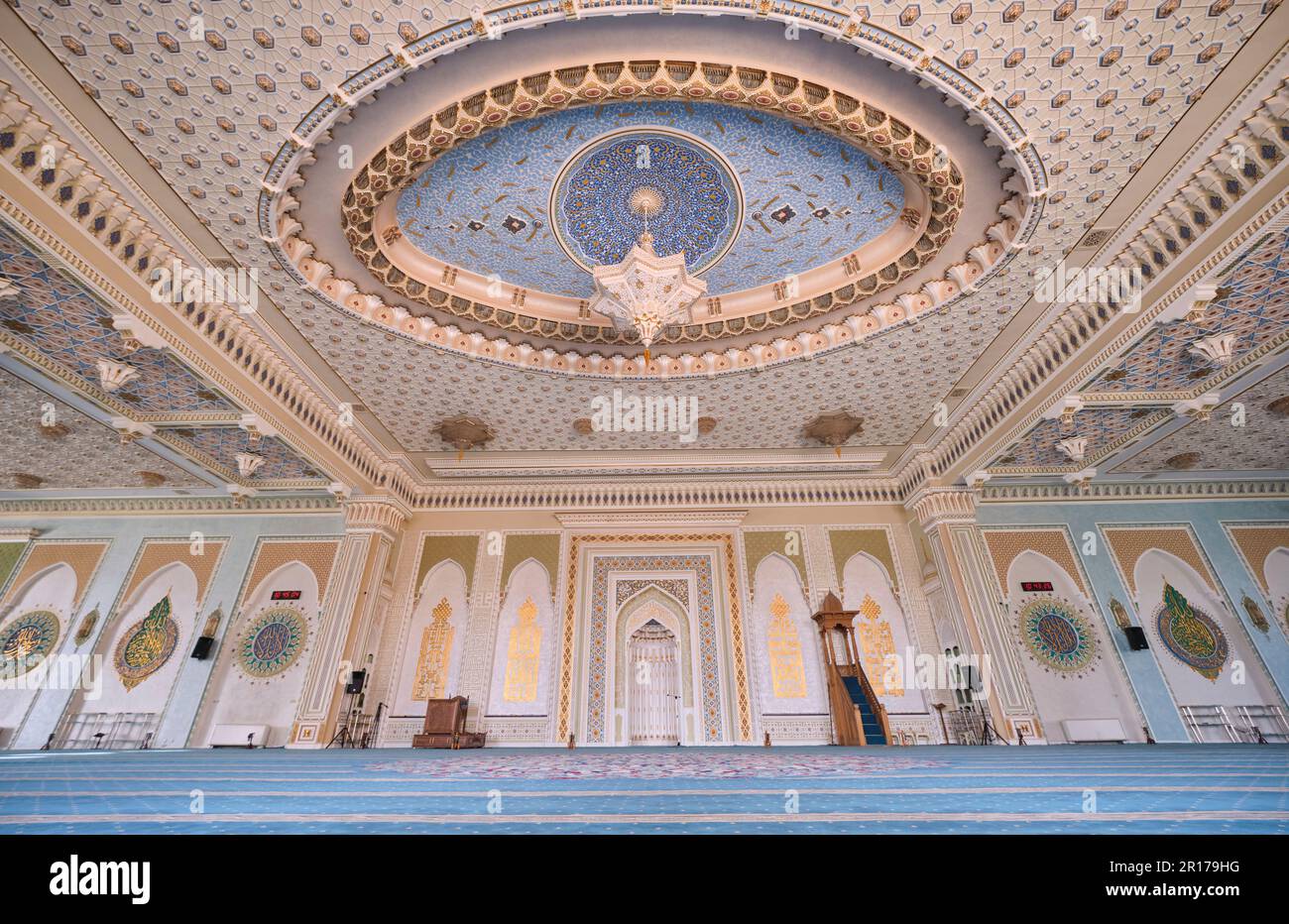 View of the center interior of the mosque, with small minbar. At the ...