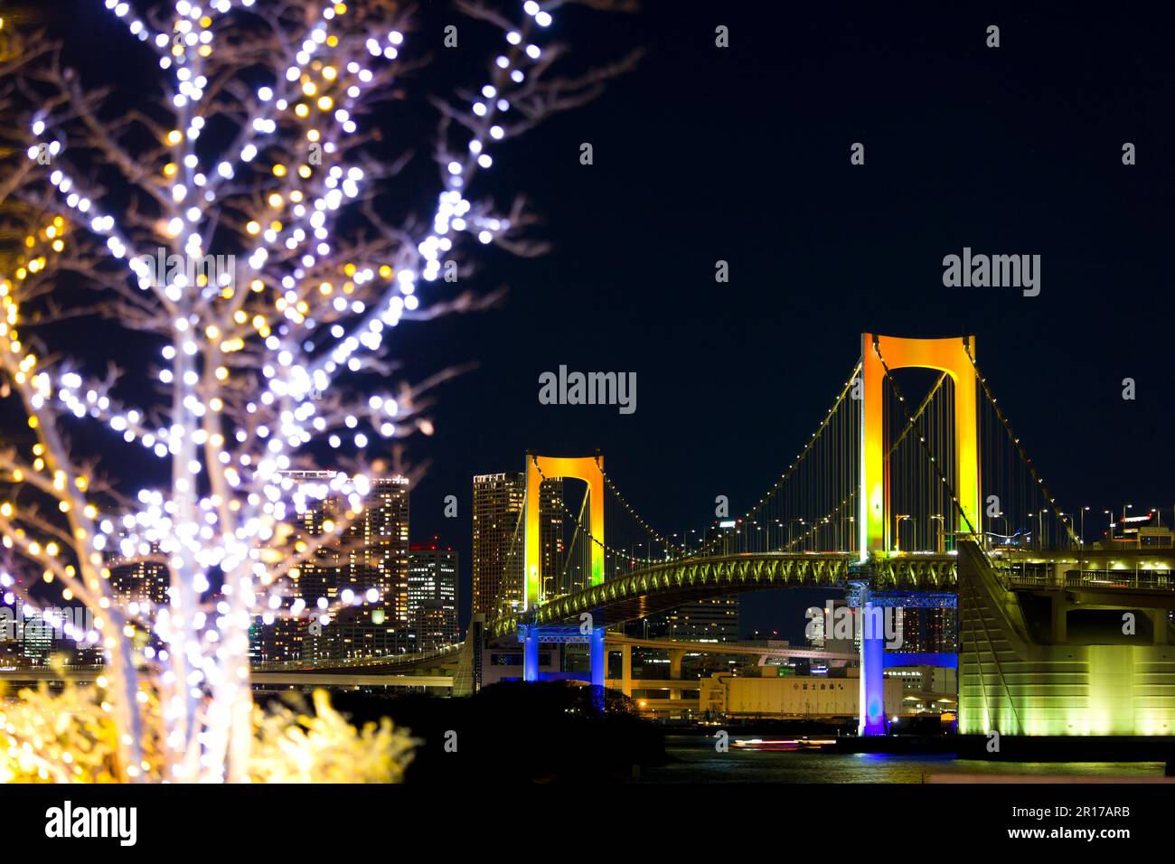 Lit up Rainbow Bridge and illuminations Stock Photo - Alamy