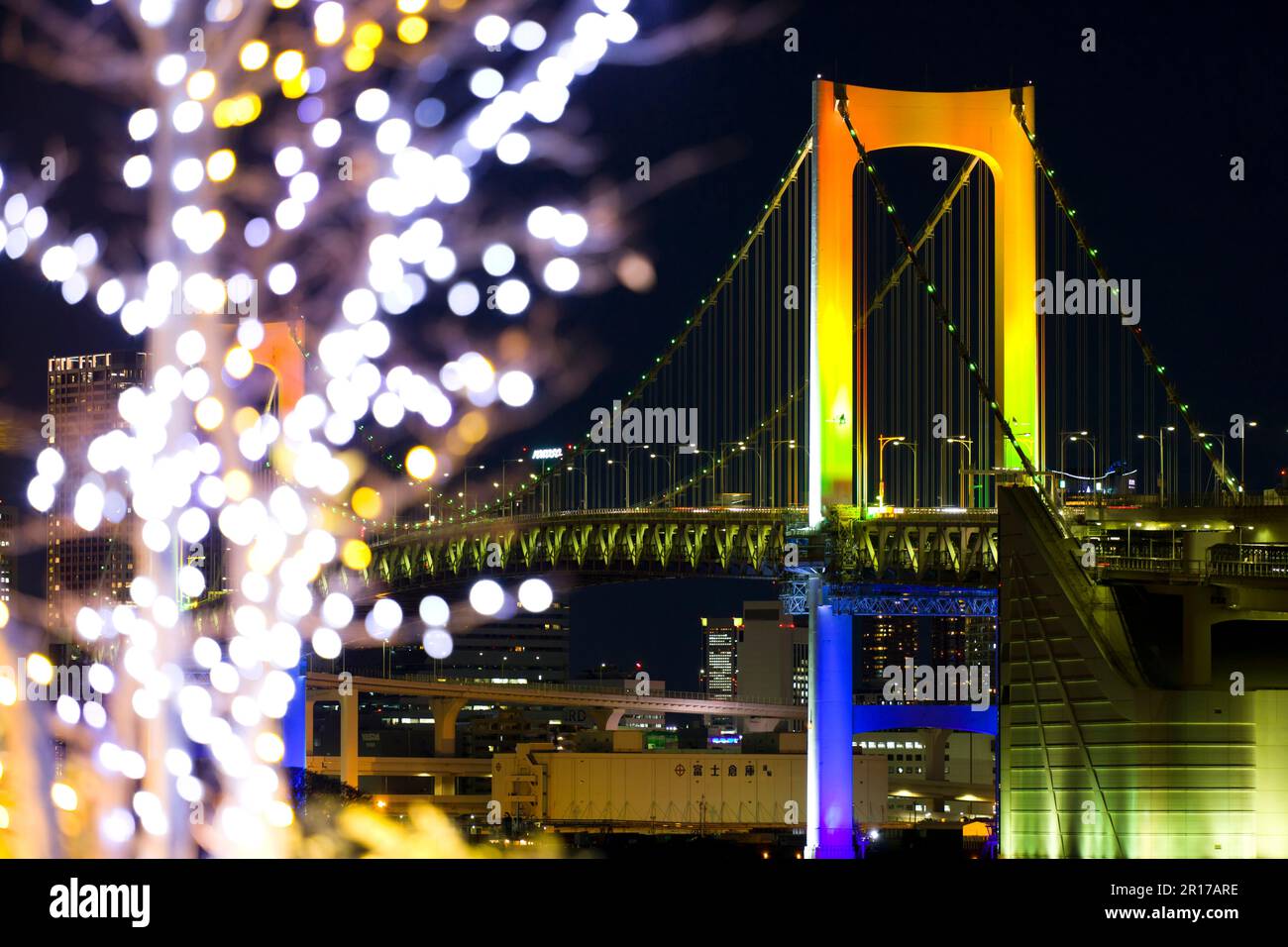 Lit up Rainbow Bridge and illuminations Stock Photo - Alamy