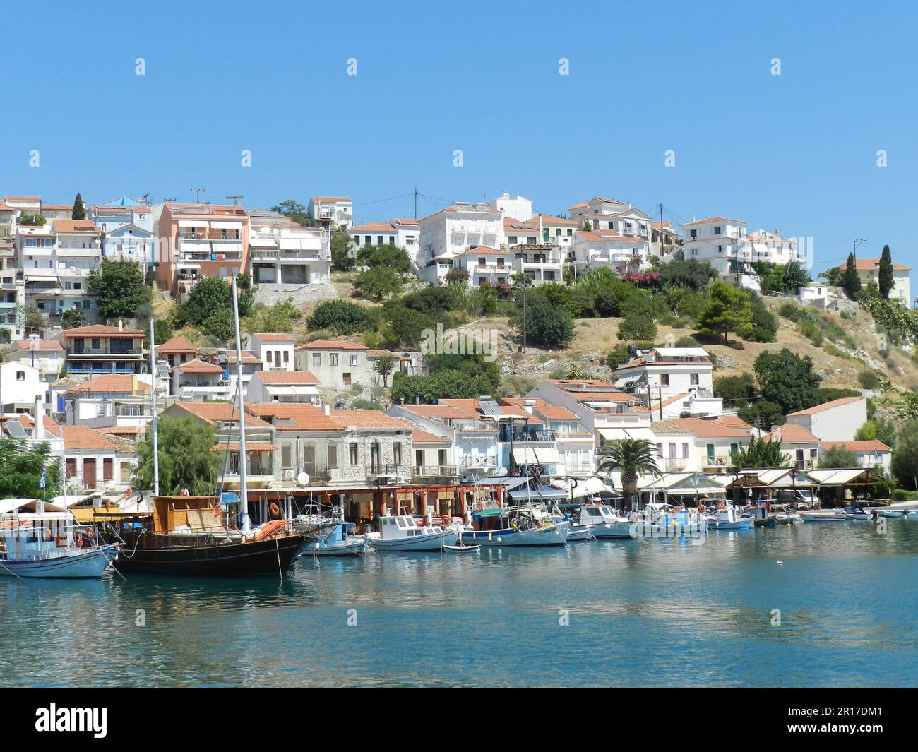 Greece, Island of Samos: the waterfront at Vathy, with fishing boats ...