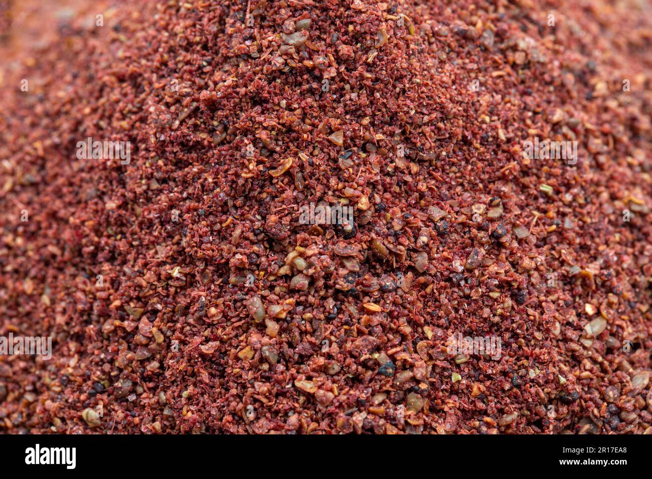 Close-up sumac background. Dried ground red Sumac powder spices. Spices ...
