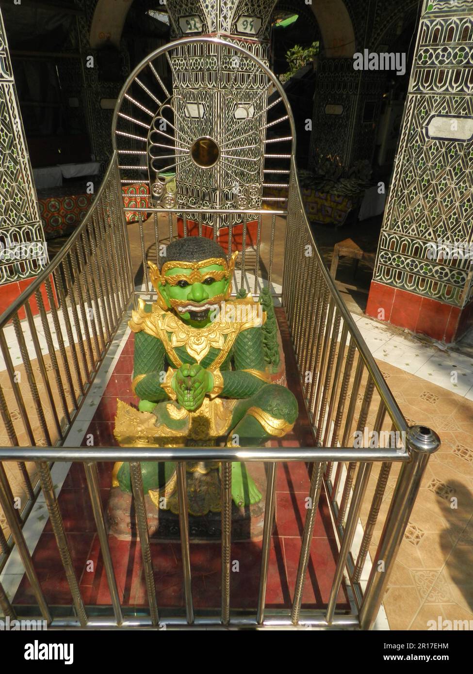 Myanmar, Mandalay: an ogre king, with his army behind him, making ...