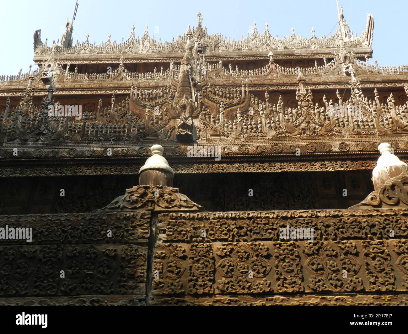 Myanmar, Mandalay: wooden carvings cover the exterior of Shwenandaw ...