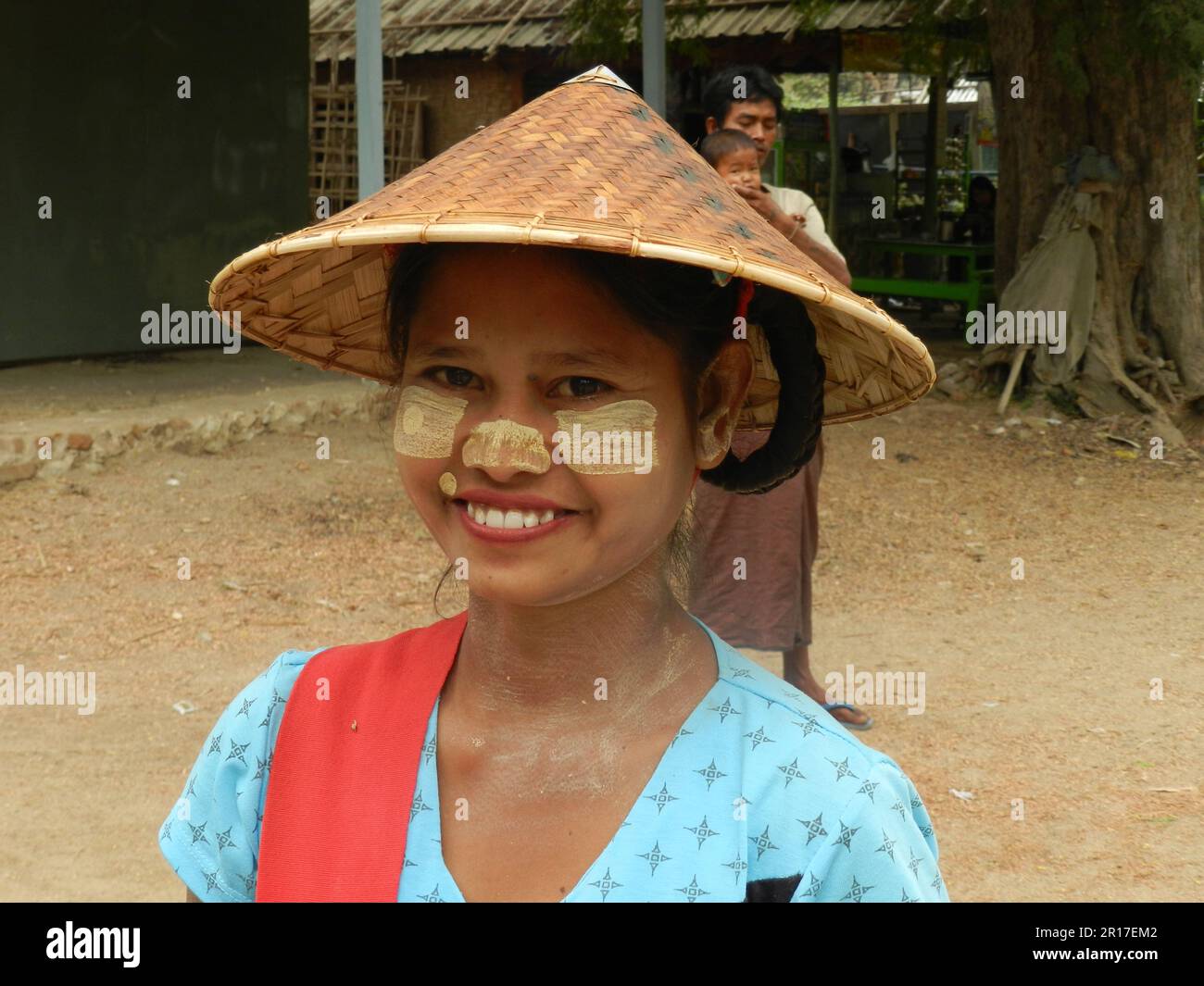 Myanmar, Mandalay, Mingun: Pretty Burmese girl with a fan Stock Photo ...